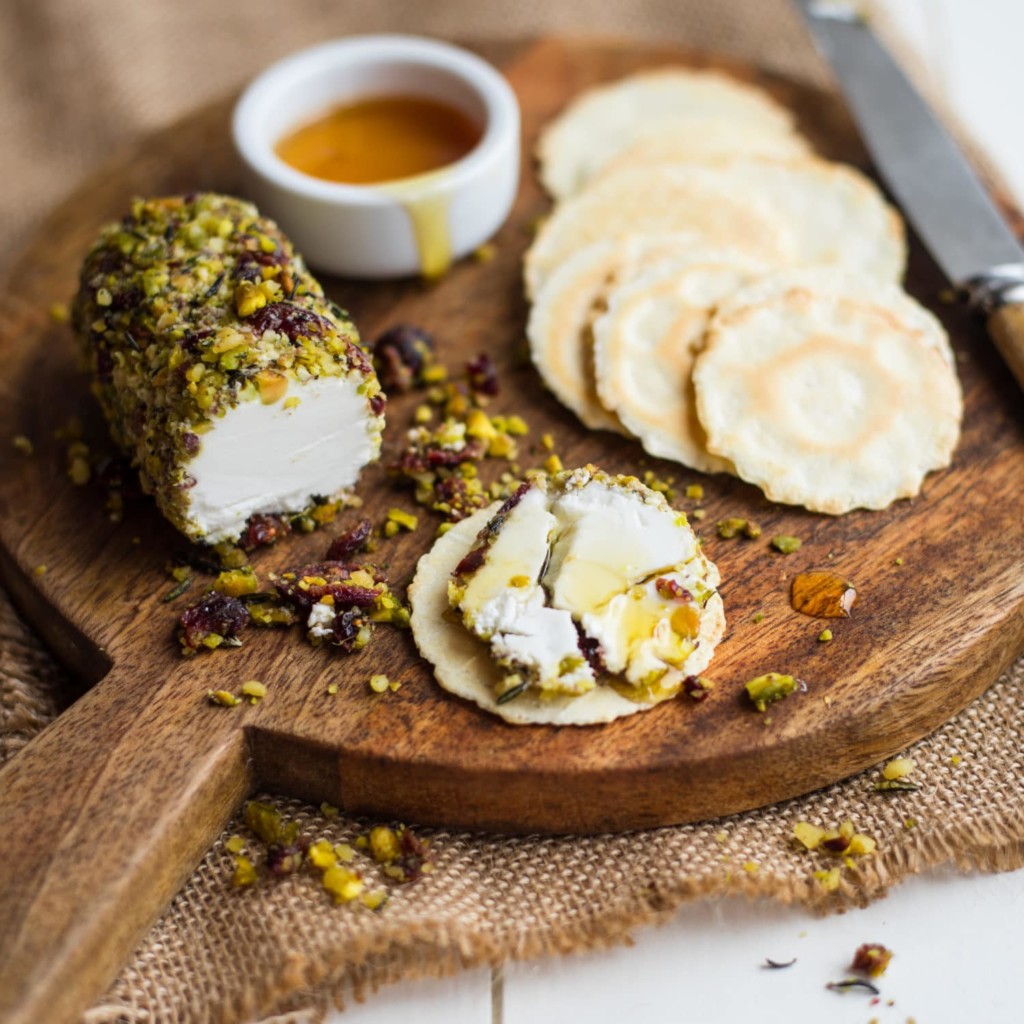 Goats cheese log with cranberries, nuts, herbs and honey - Nadia Lim